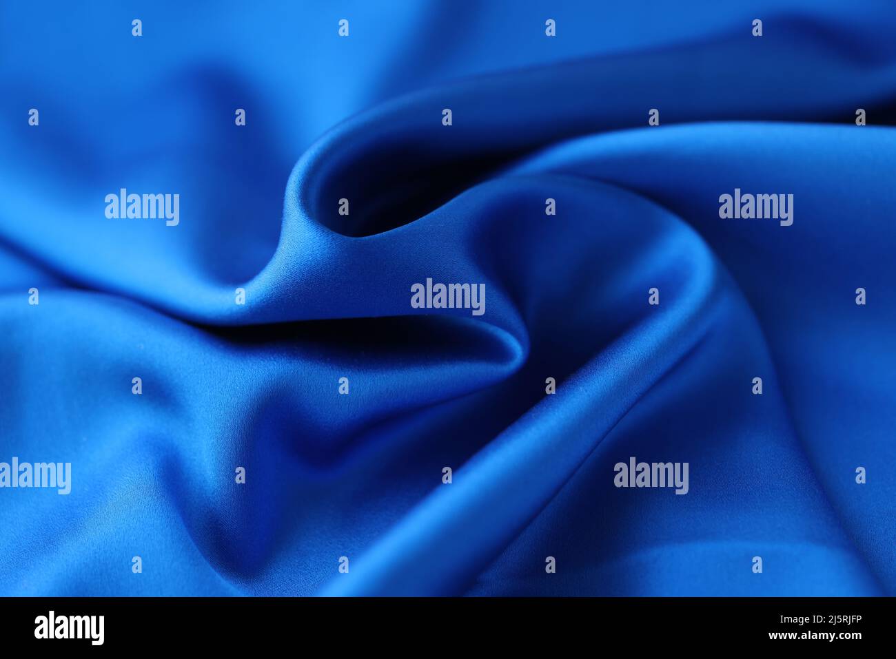Blue satin fabric closeup. Natural fabric or polyester satin concept ...
