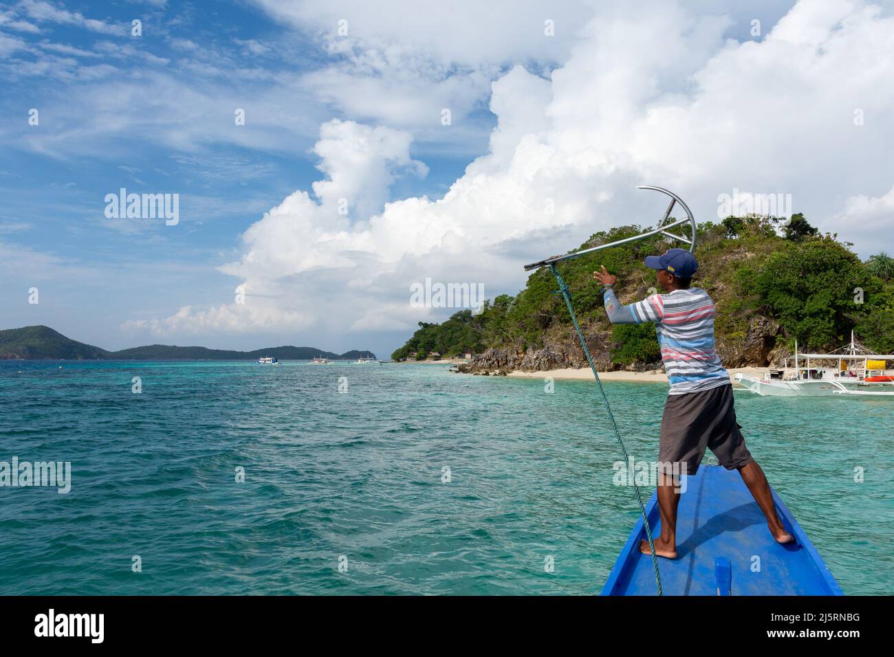Man throwing anchor from the boat, Philippines, Busuanga, Coron - 11.11 ...