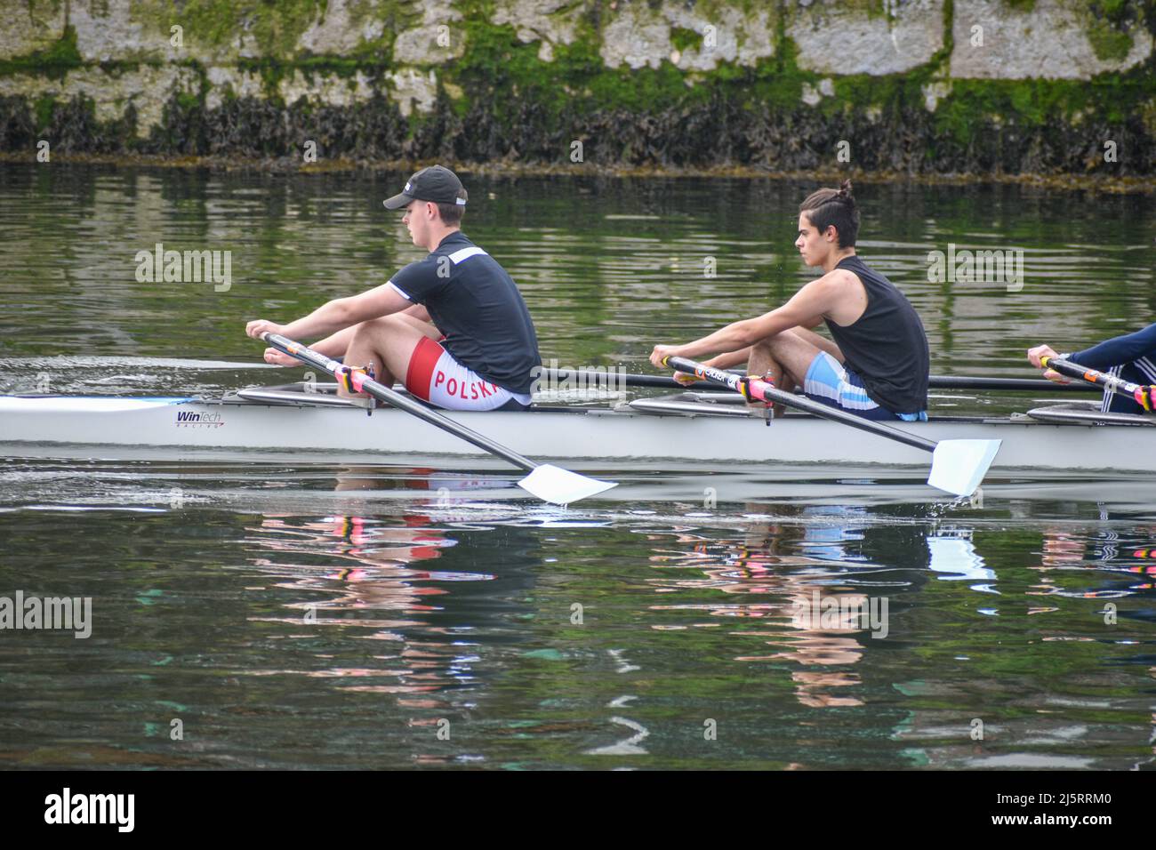 Young people rowing in Cork city Stock Photo - Alamy