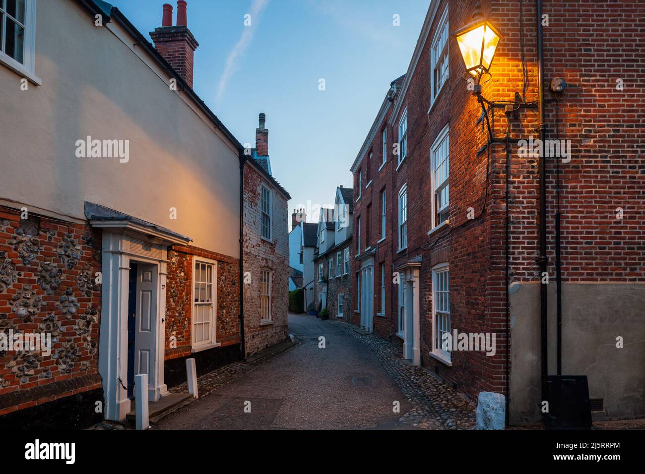 Night falls on Hook's Walk in Norwich historic centre, Norfolk, England ...