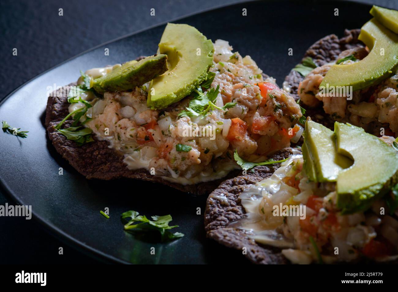 Fish Ceviche on Blue Corn Tostadas, Mexican Food Stock Photo - Alamy