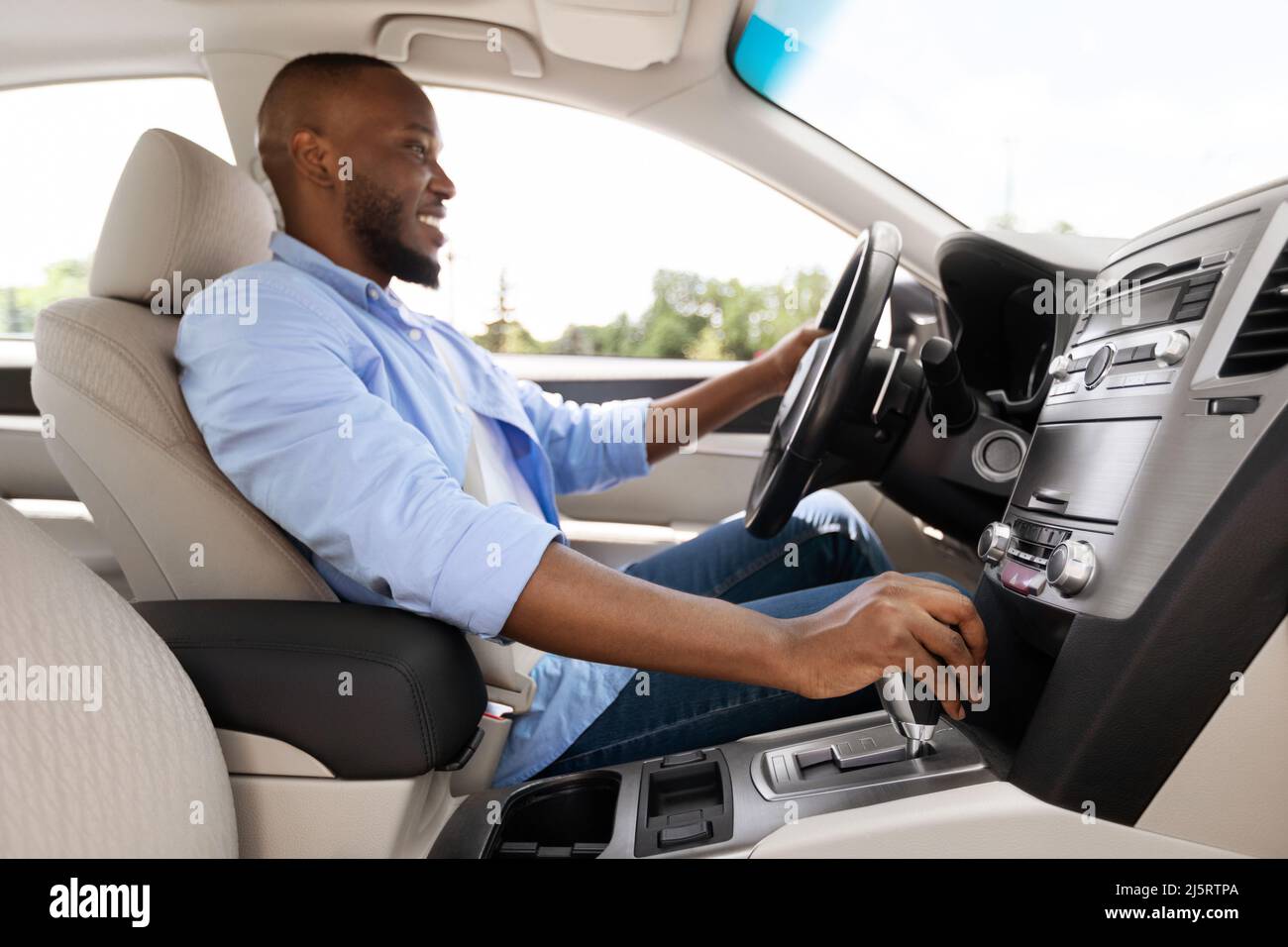 Black man driving speed car hi-res stock photography and images - Alamy
