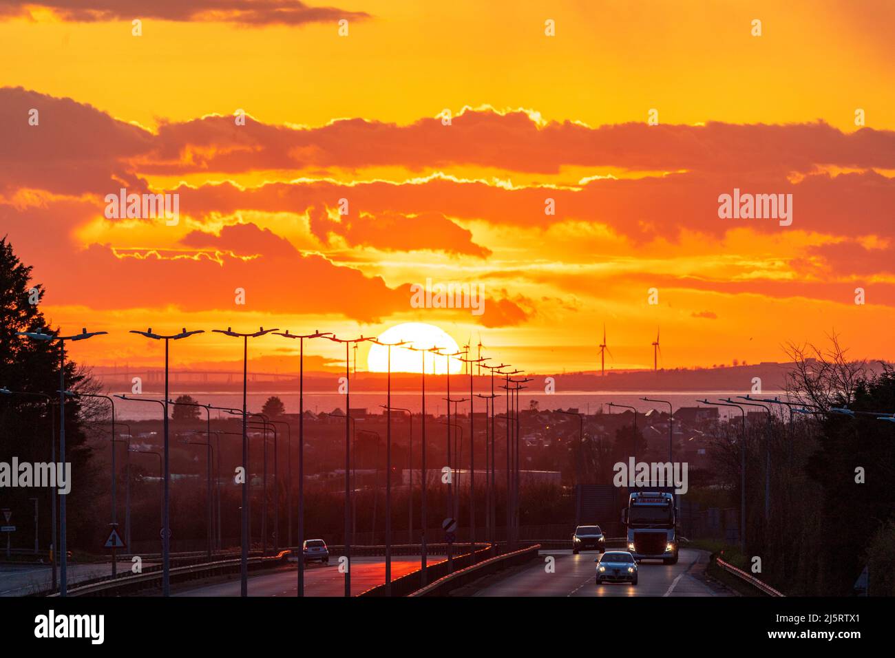 Sunset in a cloudy orange sky over the A299, Thanet Way dual ...