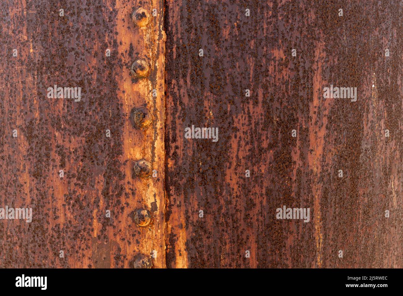 Rusty weathered metal texture with steel rivets background banner, with ...