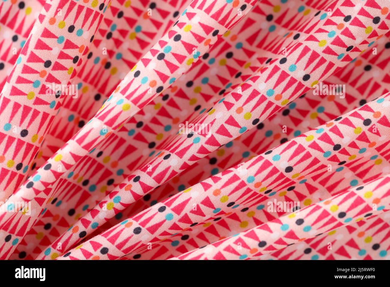 Multicolored bright cotton fabric with geometric shapes Stock Photo - Alamy