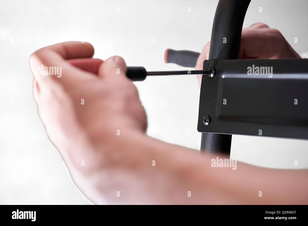 Hands with tools work on steel construction. Professions in industry ...