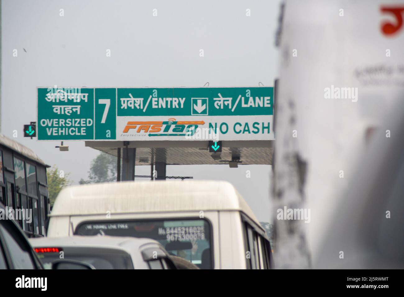 Congested traffic jam cars in front of a toll booth showing the new ...