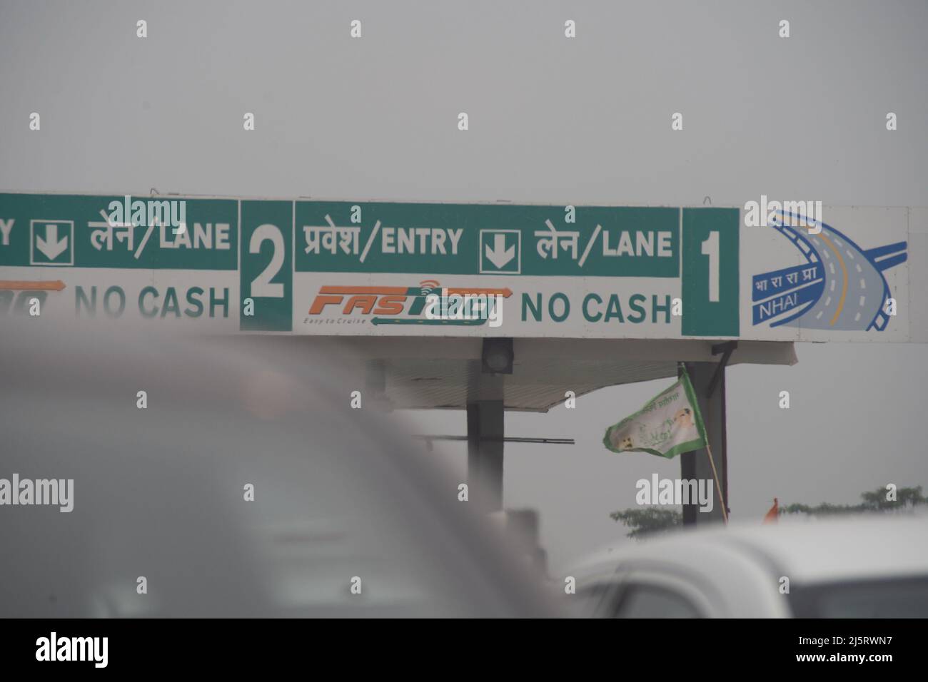 Congested traffic jam cars in front of a toll booth showing the new ...