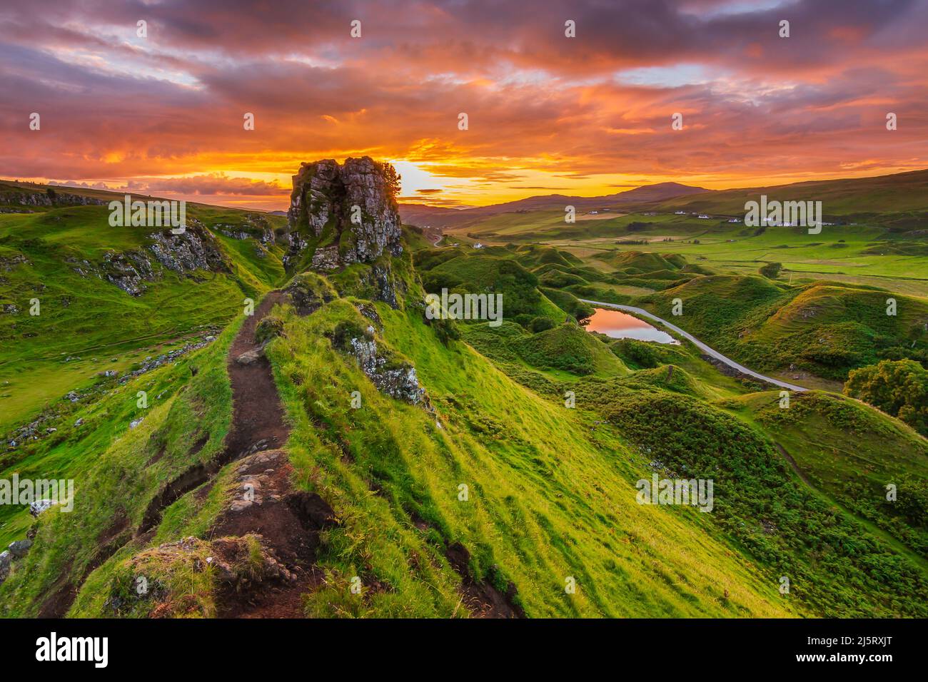 Sunset on the Isle of Skye in Summer. Landscape with rocks Castle Ewen ...