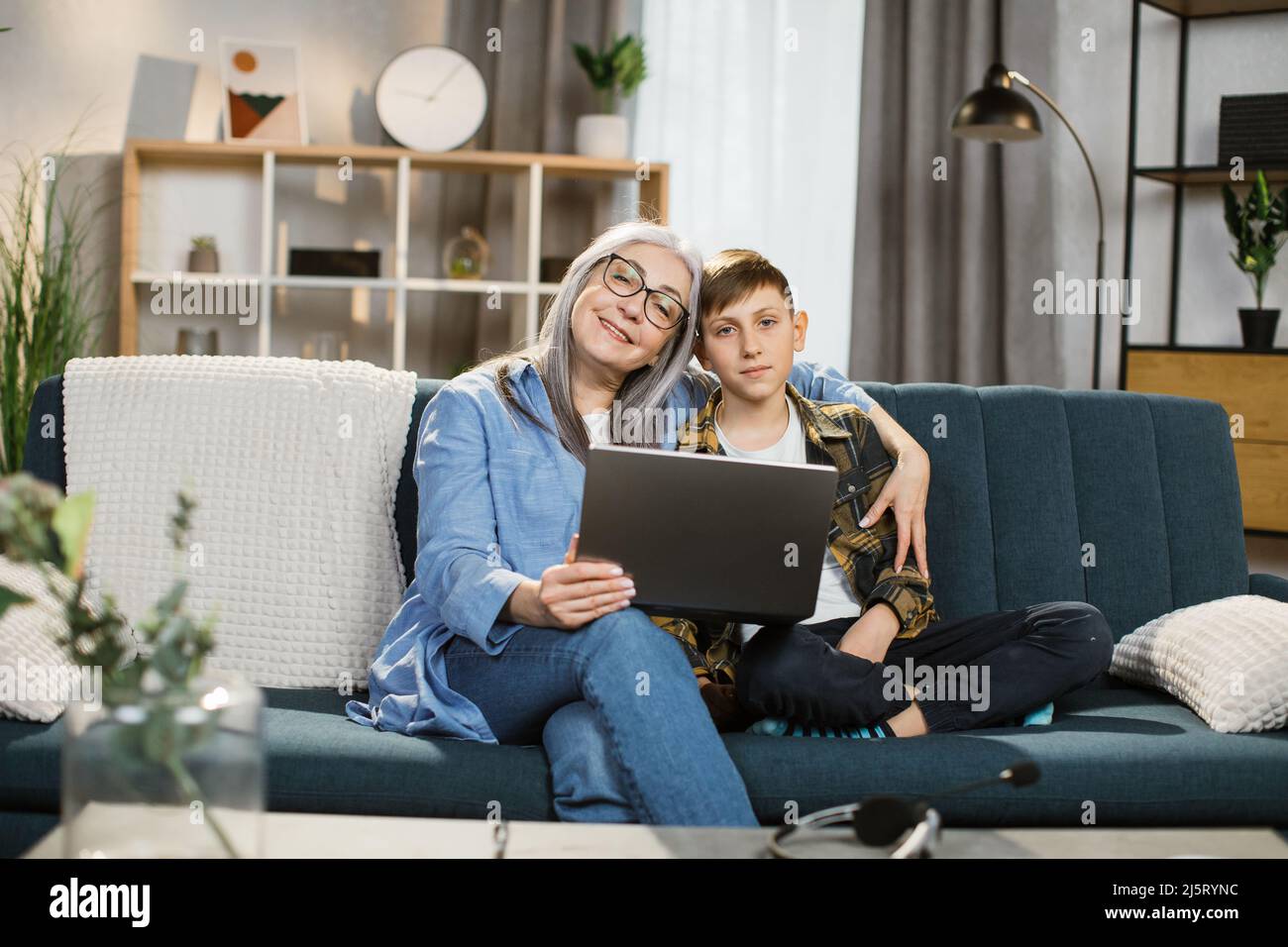 Grandmother grandson laptop hi-res stock photography and images - Alamy