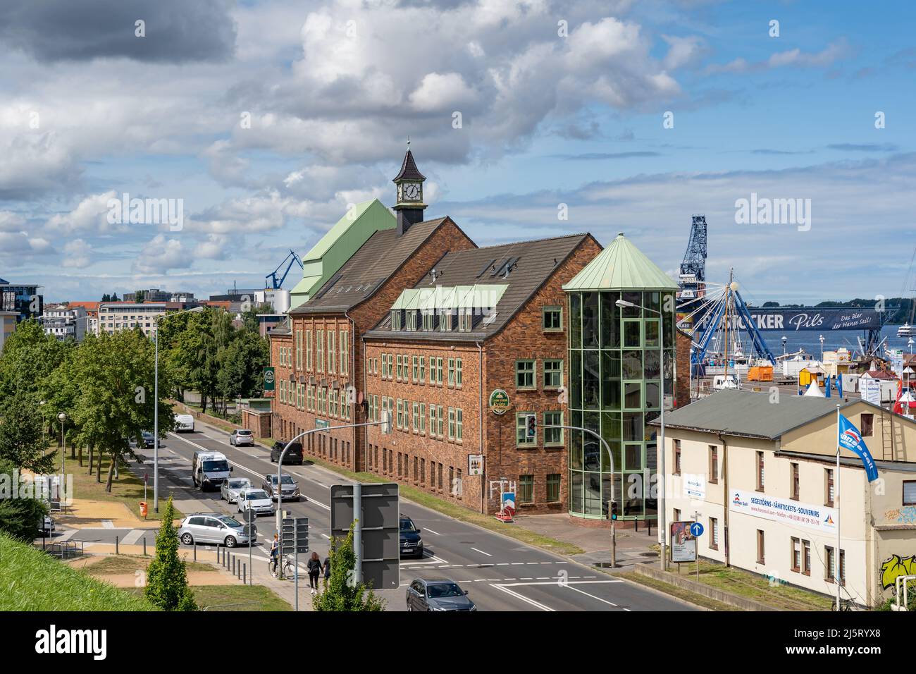 Old buildings next to the dock. Architecture in the city and a busy ...
