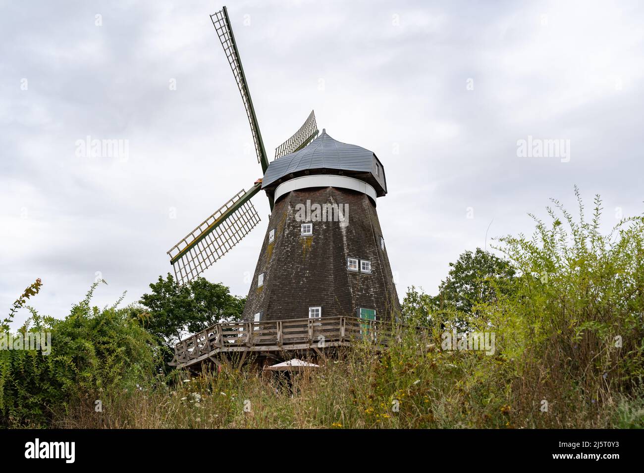 The famous windmill in front of the sky. An old historic building made ...