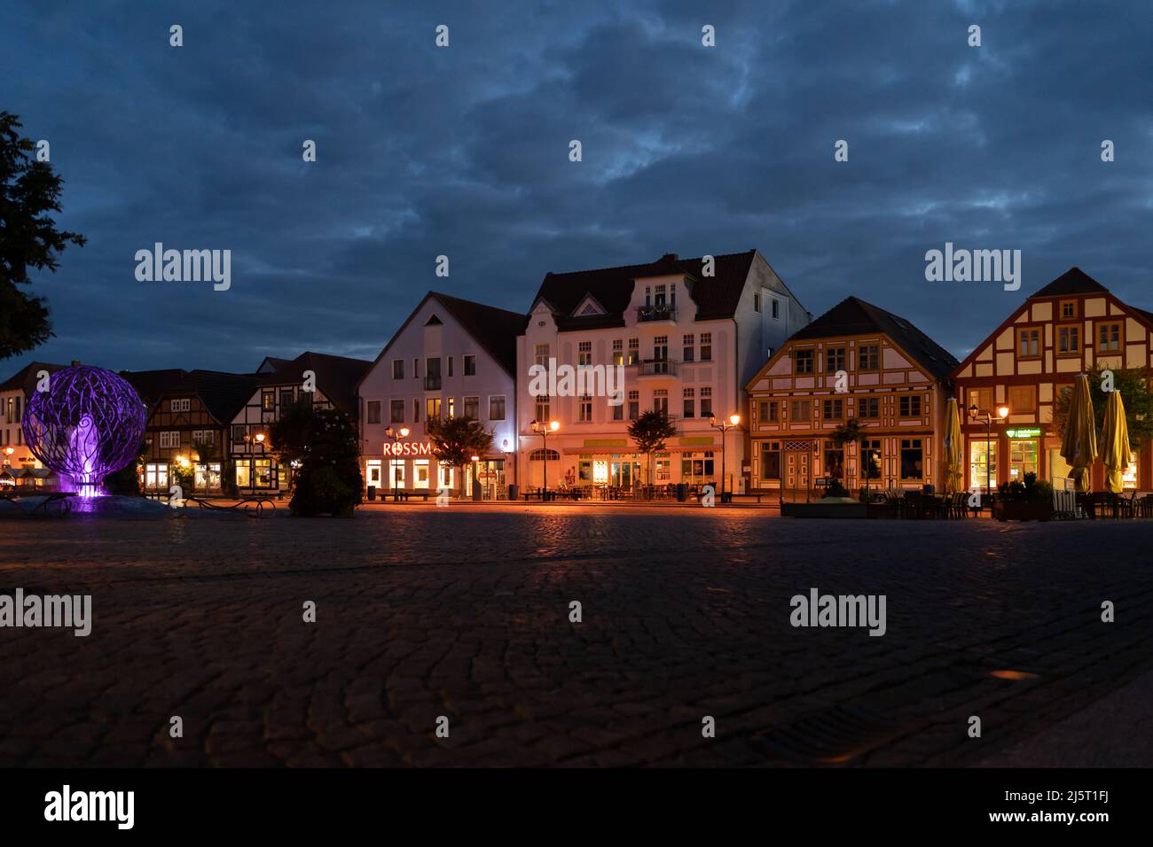 City center of the small town in the evening. The buildings are ...