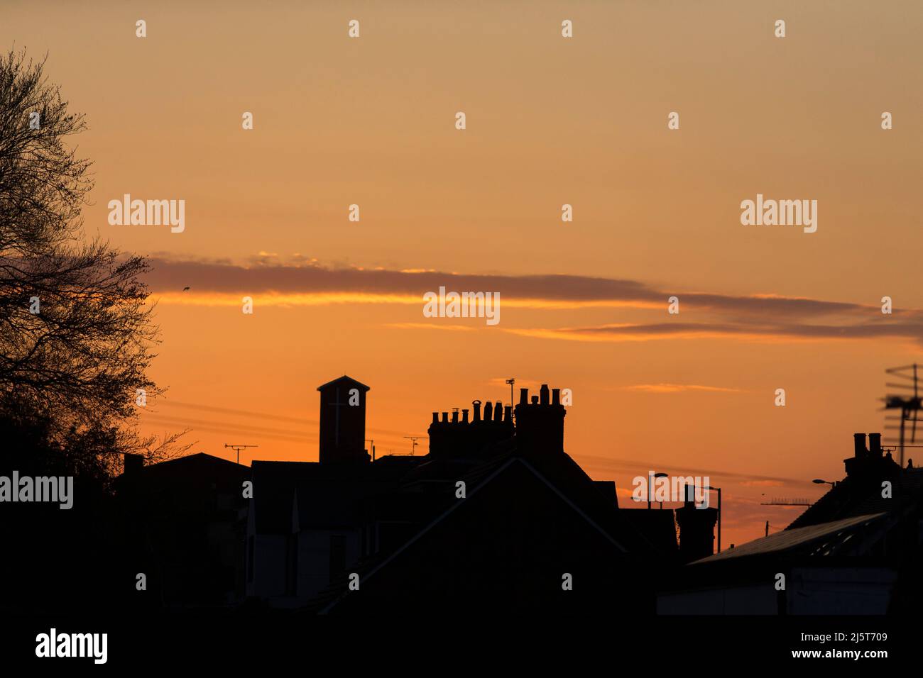 Rainham,Kent, UK. 25th April, 2022. UK Weather. Sunset over the roof ...