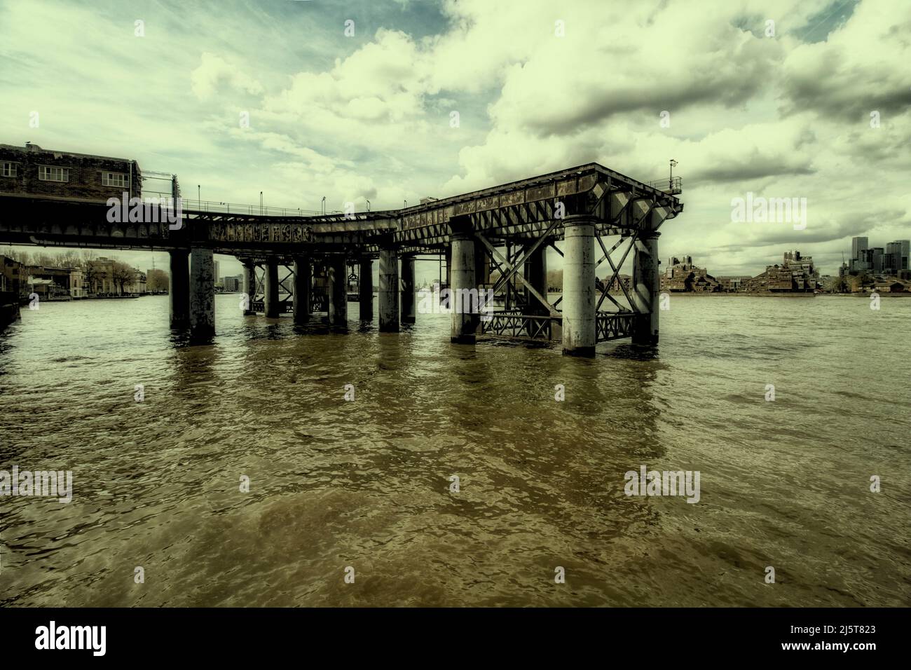 View across the Thames river in London from the Greenwich waterfront ...