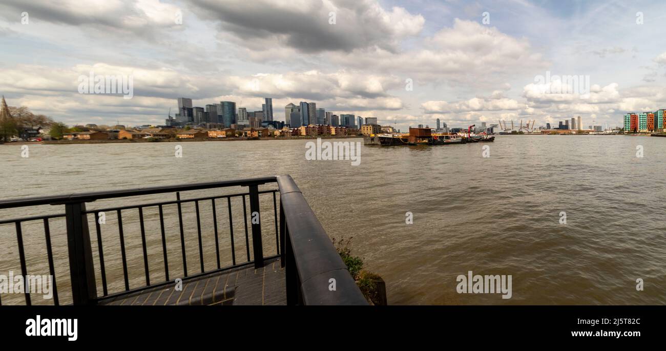 View across the Thames river in London from the Greenwich waterfront ...