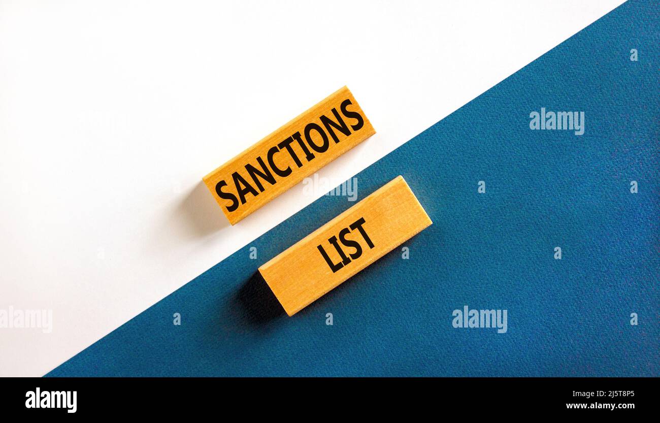 Sanctions list symbol. Wooden blocks with concept words Sanctions list ...