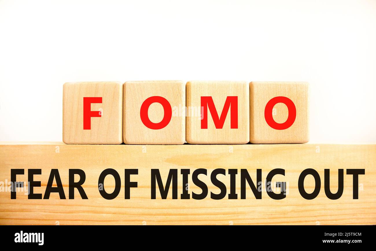 FOMO fear of missing out symbol. Concept words FOMO fear of missing out ...