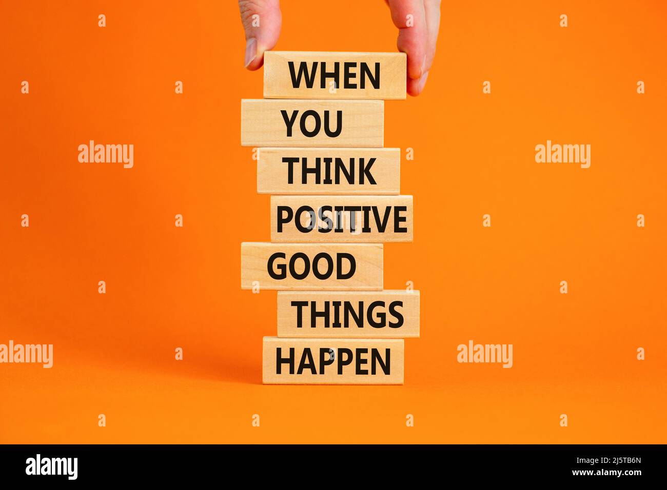 Think positive symbol. Wooden blocks with concept words When you think ...