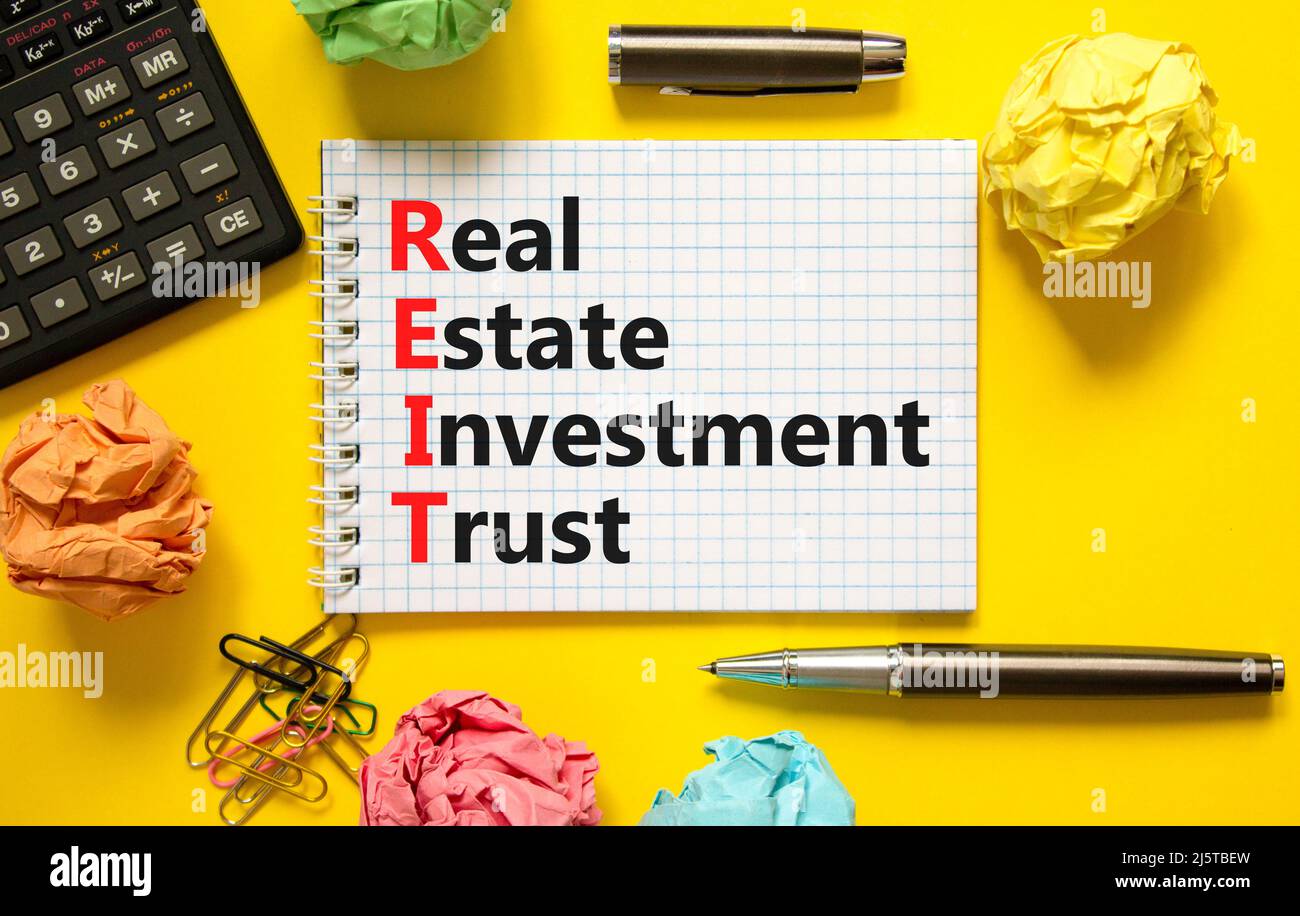 REIT real estate investment trust symbol. Concept words REIT real ...