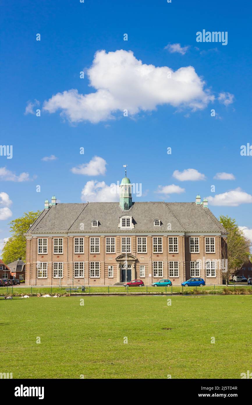 Front facade of the historic school building in Veendam, Netherlands ...