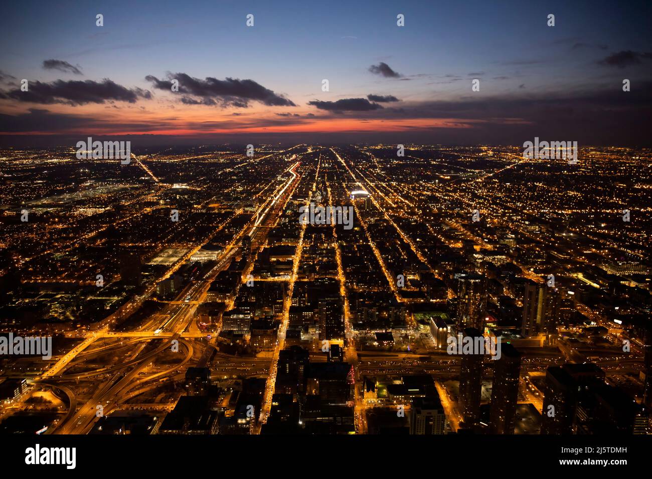 Looking down at the city at night from above Stock Photo - Alamy