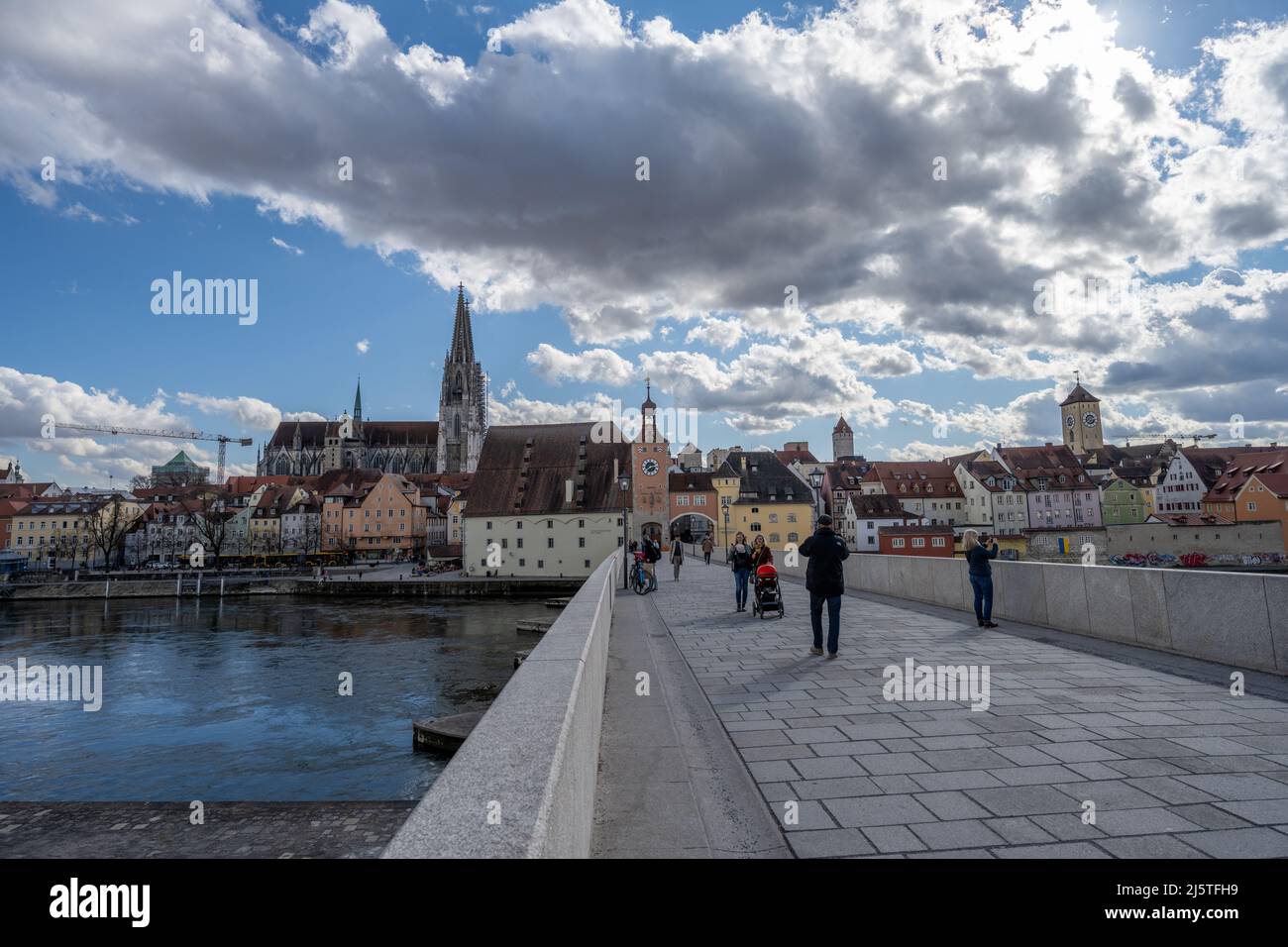 Panoramic view of Regensburg across the old stone bridge. Germany Stock ...