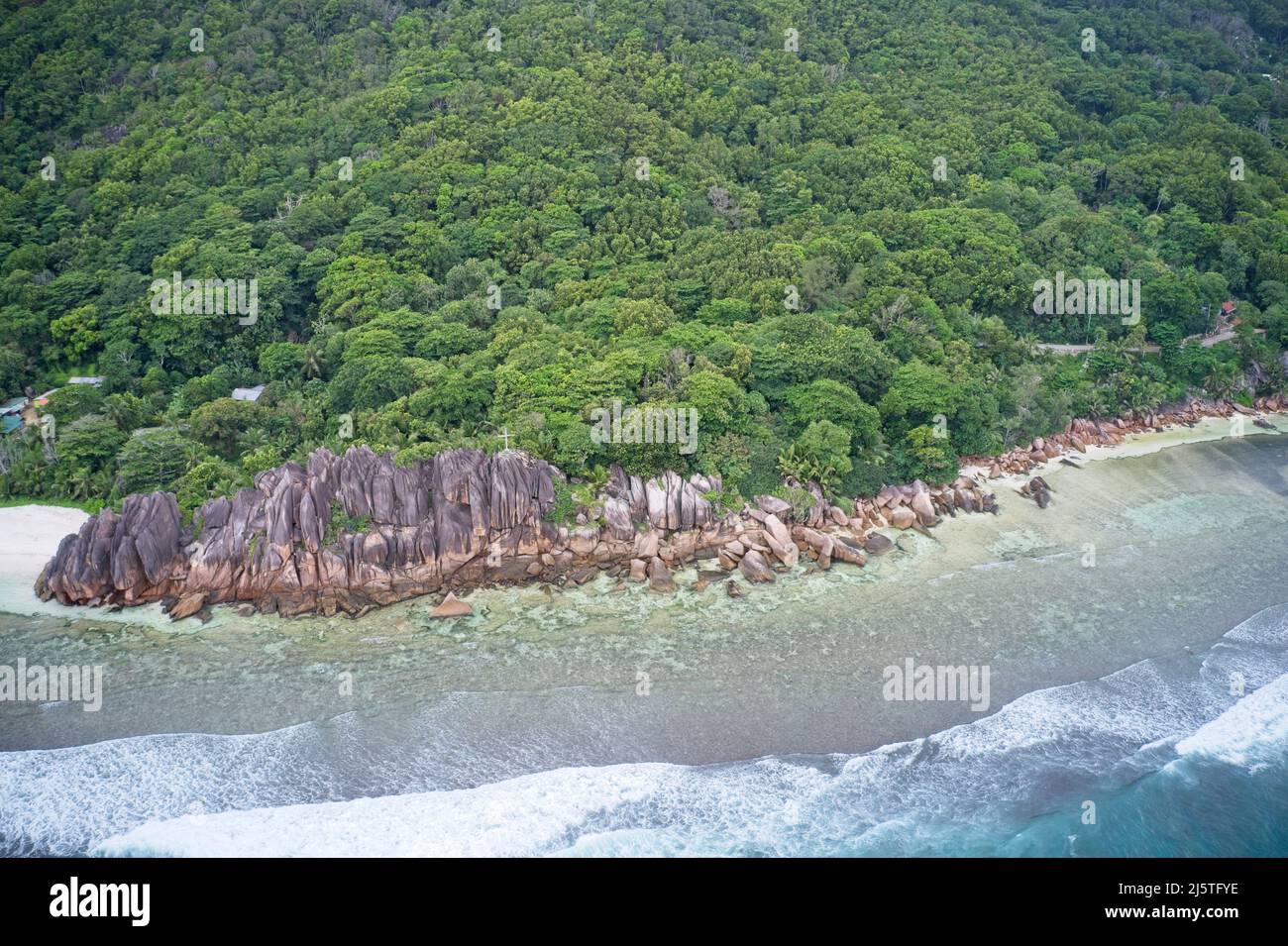 Aerial view of rocks, cliff and beach forming patterns in nature ...