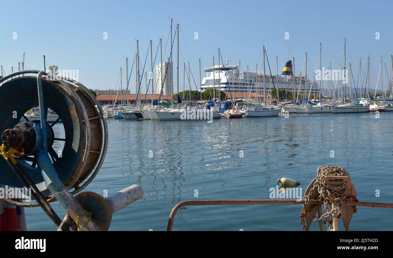 Port of Toulon with ferry from Corsica and old rig in the foreground ...