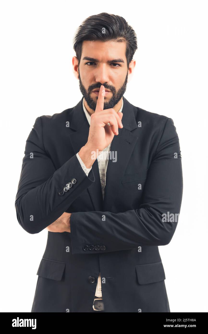 Make silence please Portrait of serious brunette man with beard in suit ...