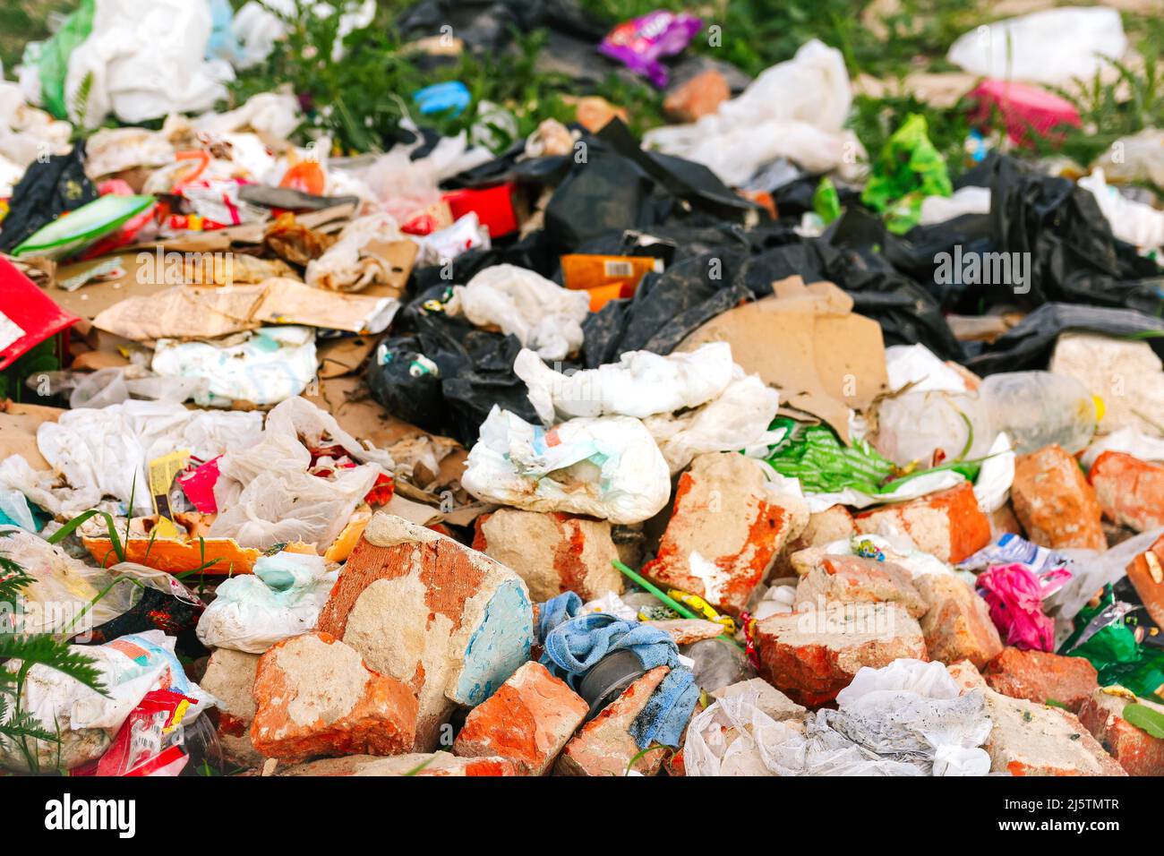 Defocus huge landfill of garbage. Concept of ecology. Large garbage ...