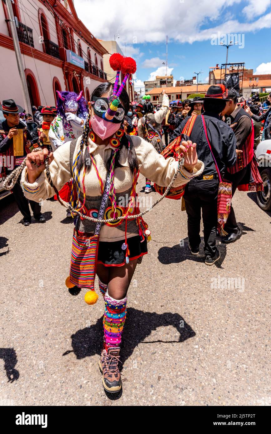 Young People In Colourful Costumes Dance Around The Plaza De Armas ...