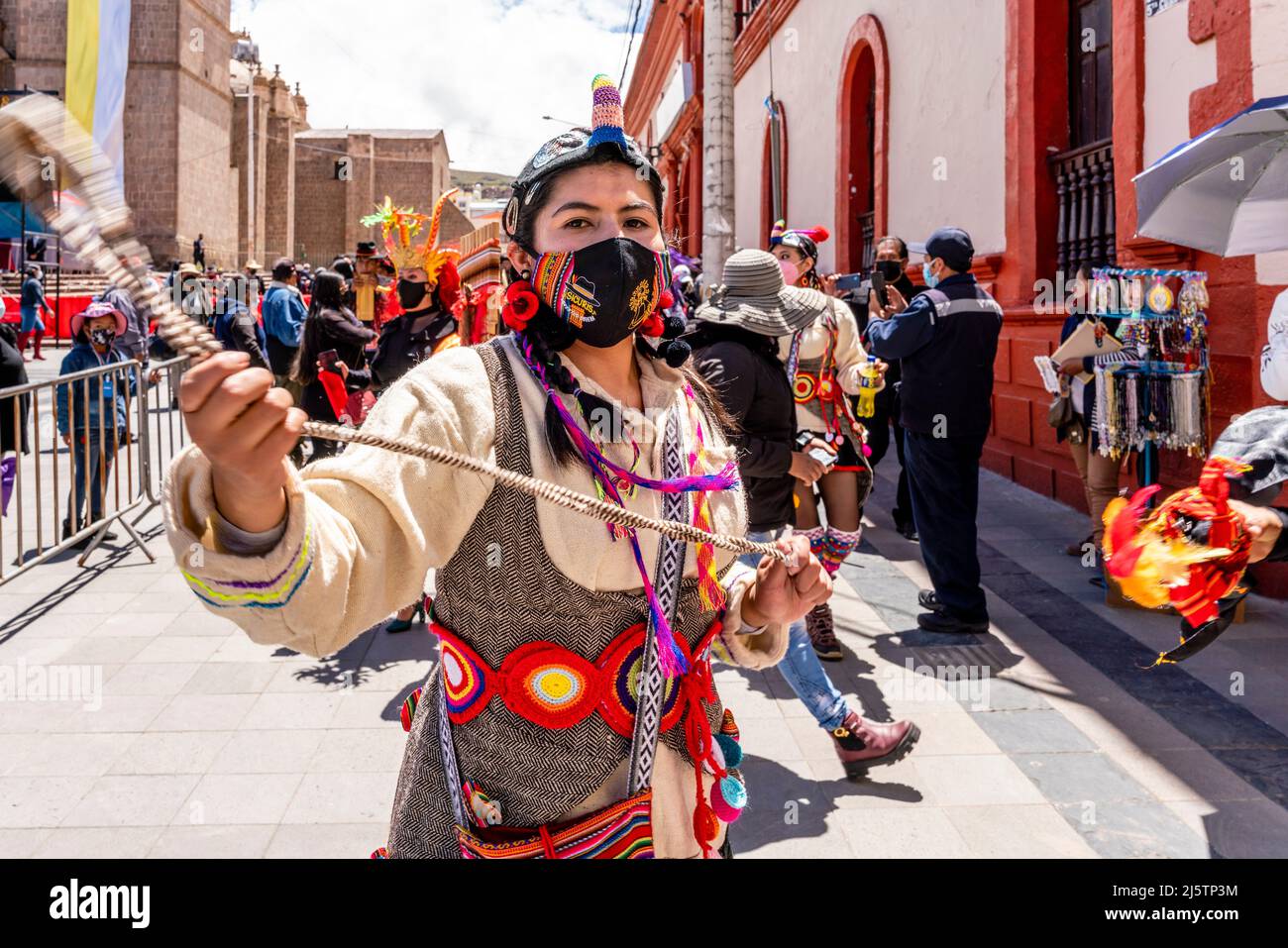 Young People In Colourful Costumes Dance Around The Plaza De Armas ...