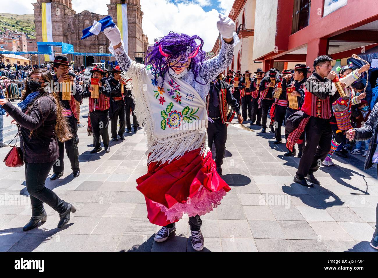 Young People In Colourful Costumes Dance Around The Plaza De Armas ...