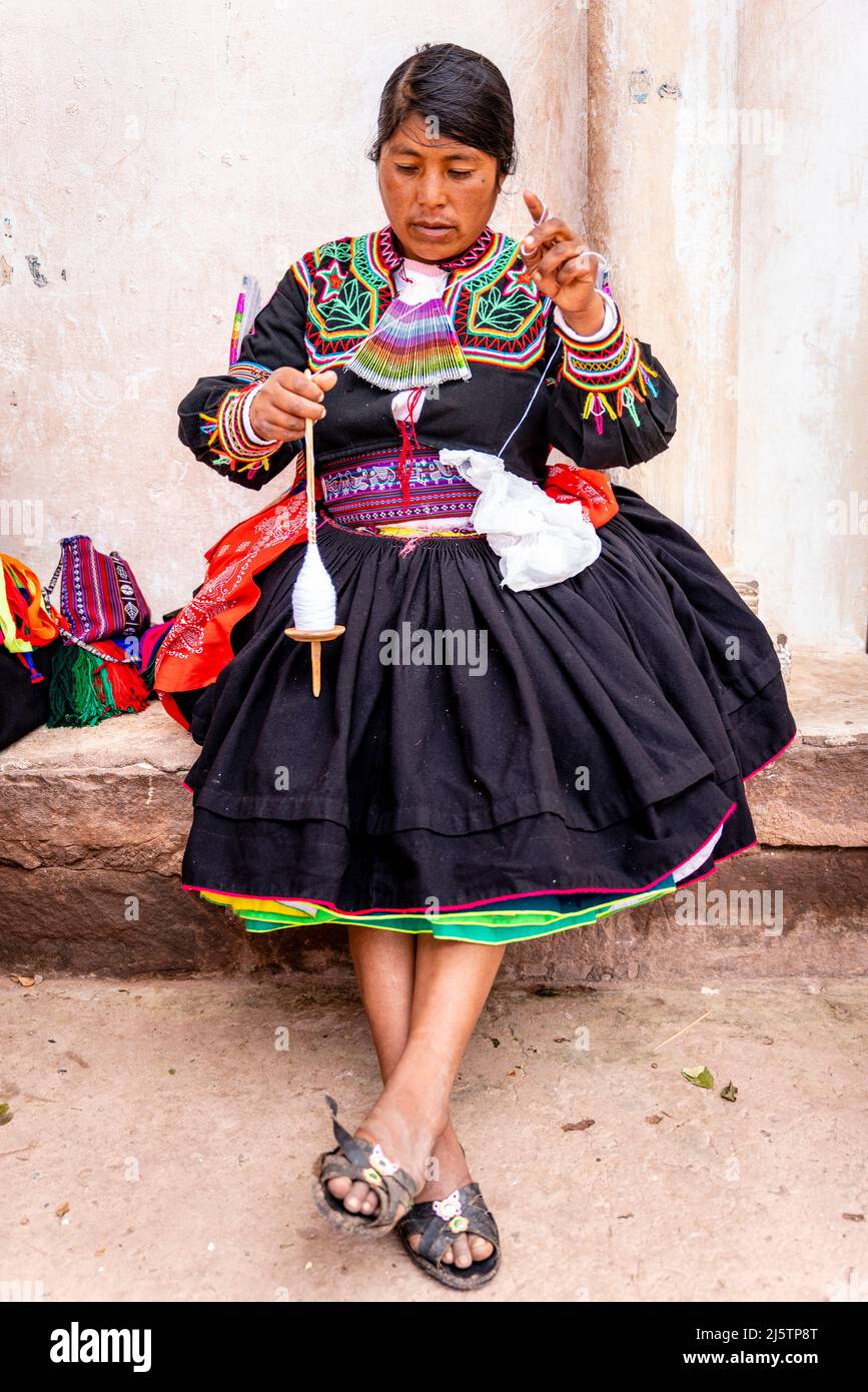 A Taquileno Woman Spinning Wool, Taquile Island, Lake Titicaca, Puno ...