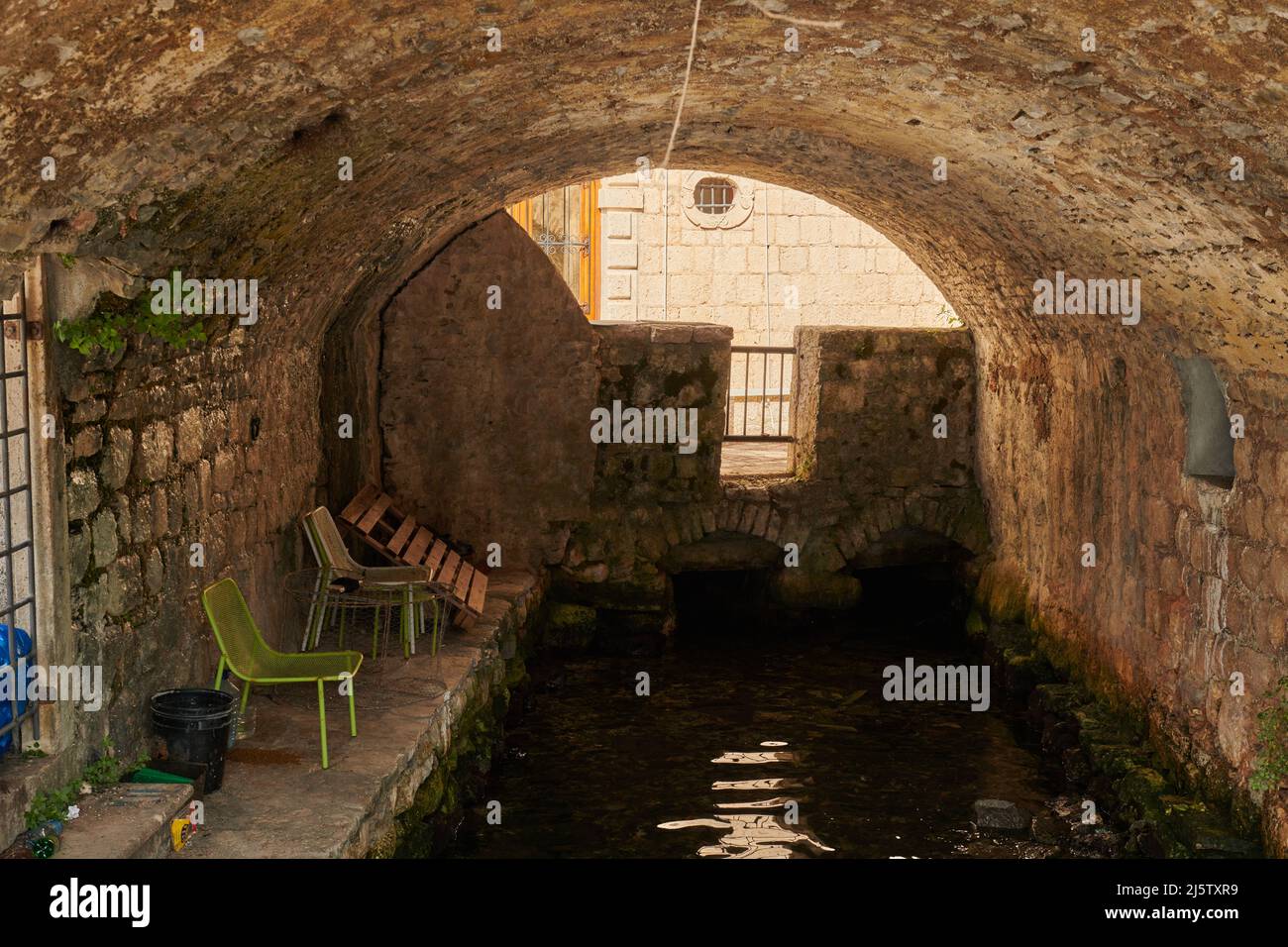 narrow flooded basement stone arched in montenegro Stock Photo - Alamy