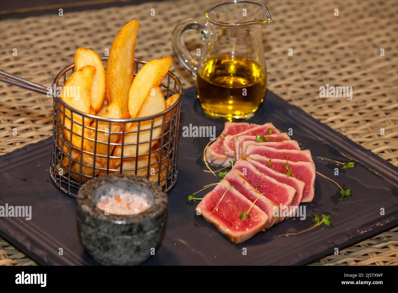 Tuna sashimi cutting raw blue fin tuna and serve in Japanese style food ...