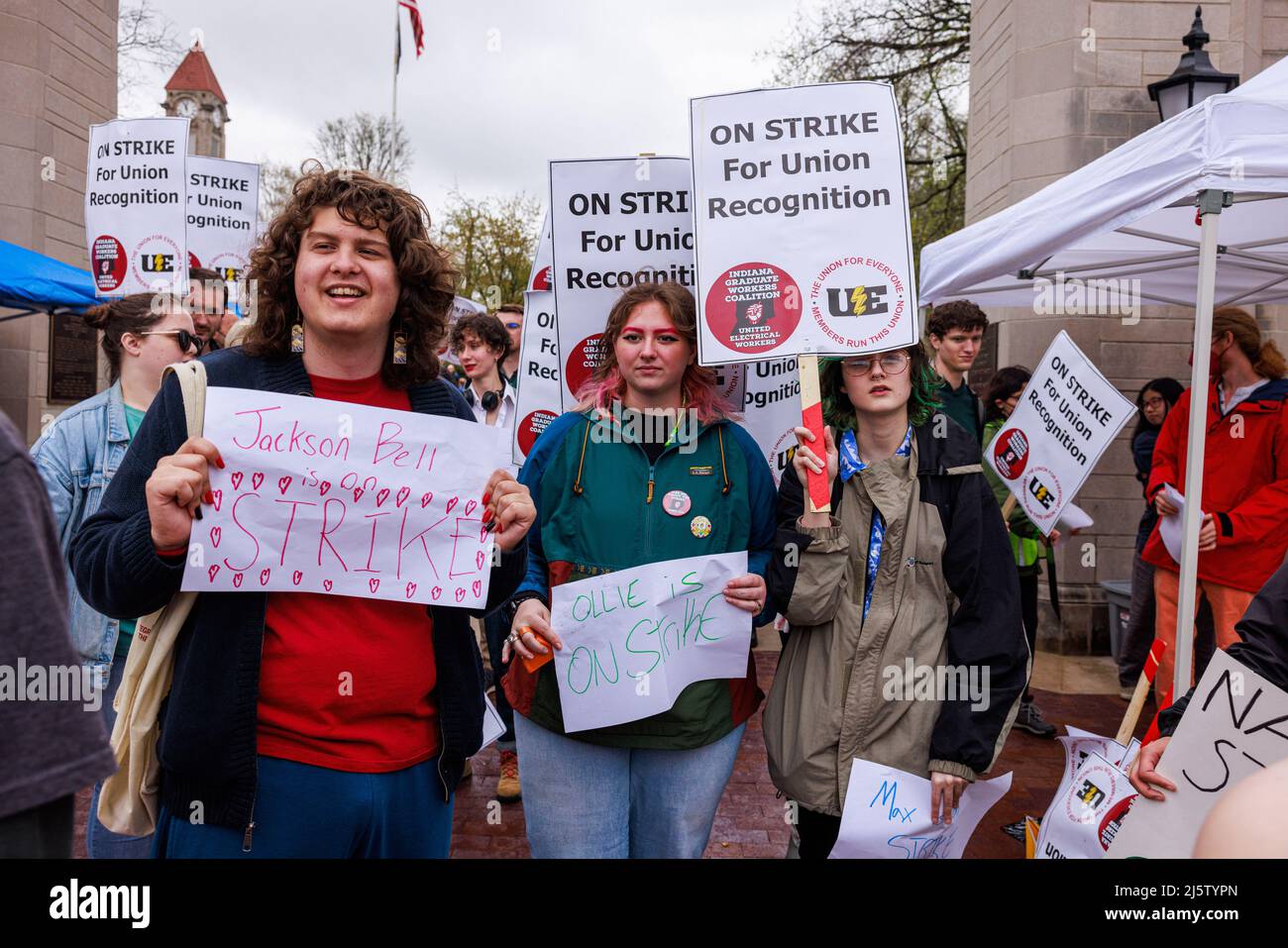 Members of the Indiana Graduate Workers Coalition and their supporters ...