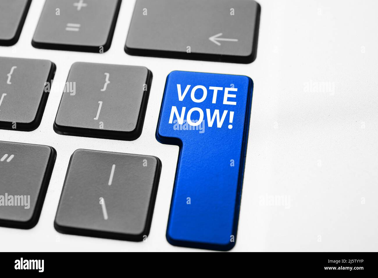 Button with text VOTE NOW on computer keyboard, closeup Stock Photo - Alamy