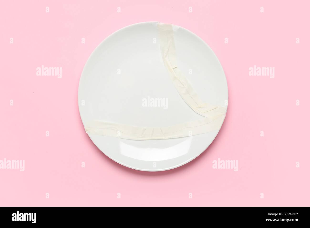 Broken plate fixed hi-res stock photography and images - Alamy