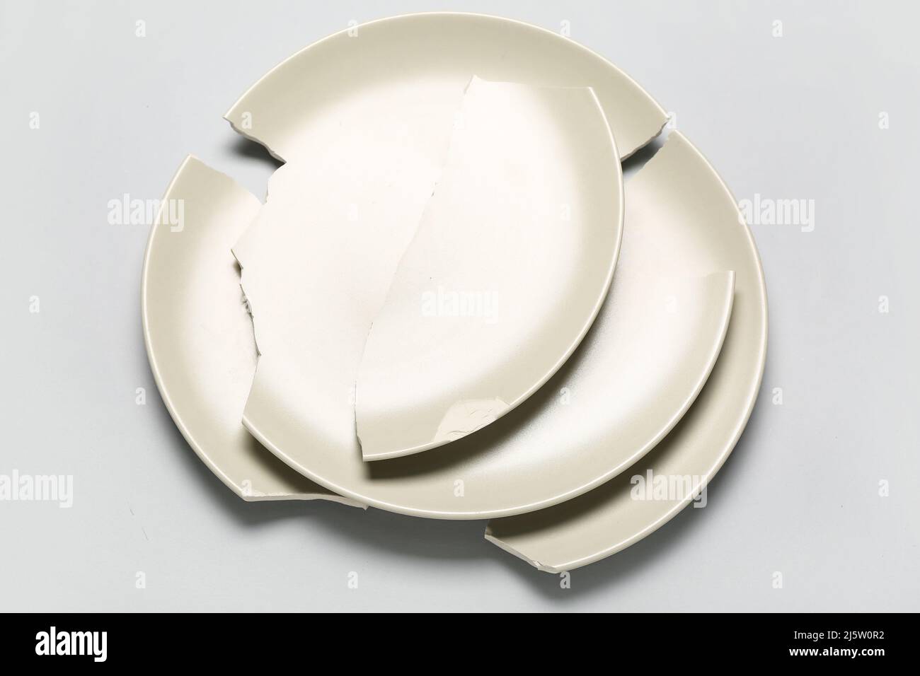 Broken plates white background hi-res stock photography and images - Alamy
