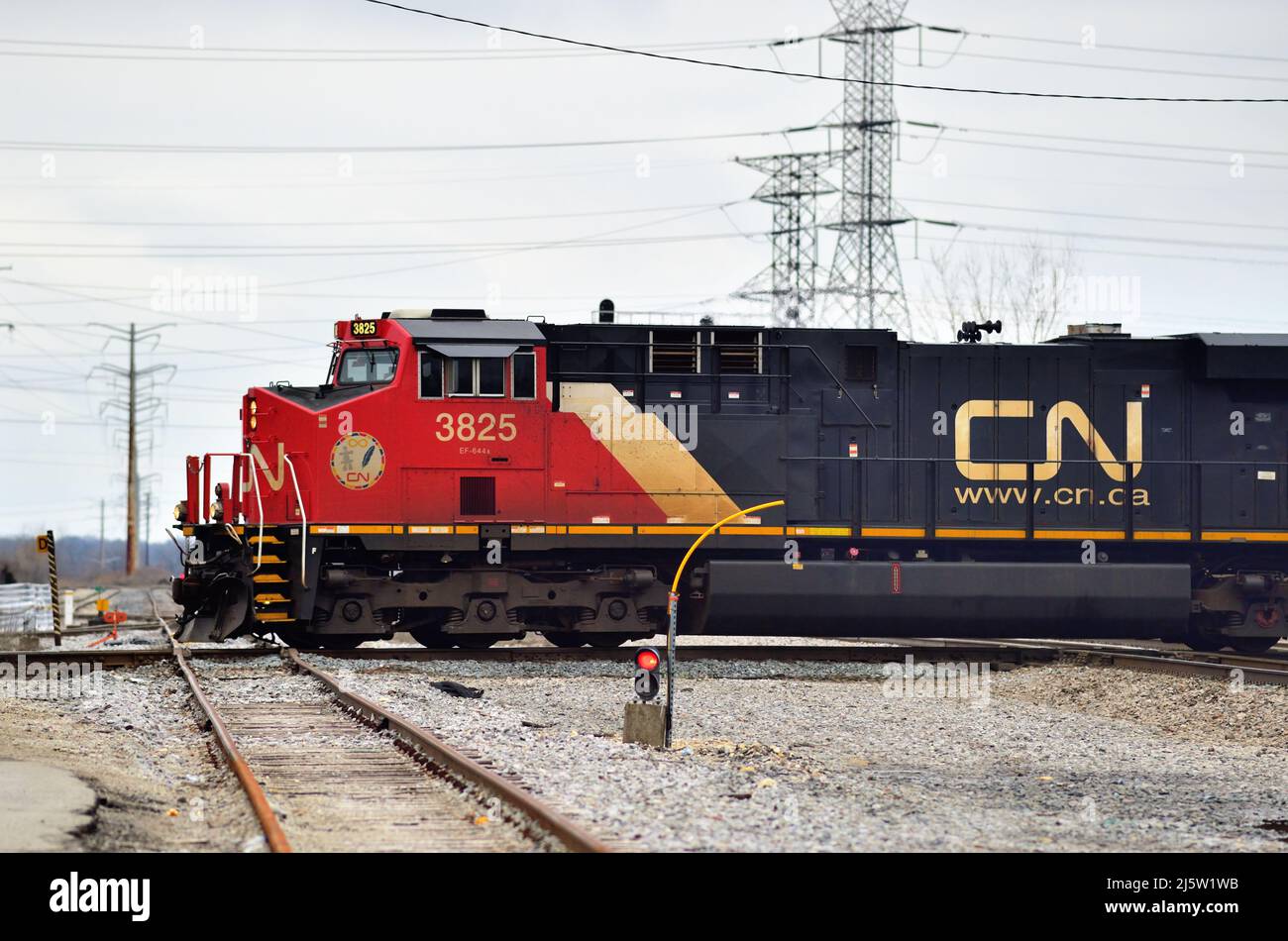 Elgin, Illinois, USA. A Canadian National Railway locomotive leads a ...