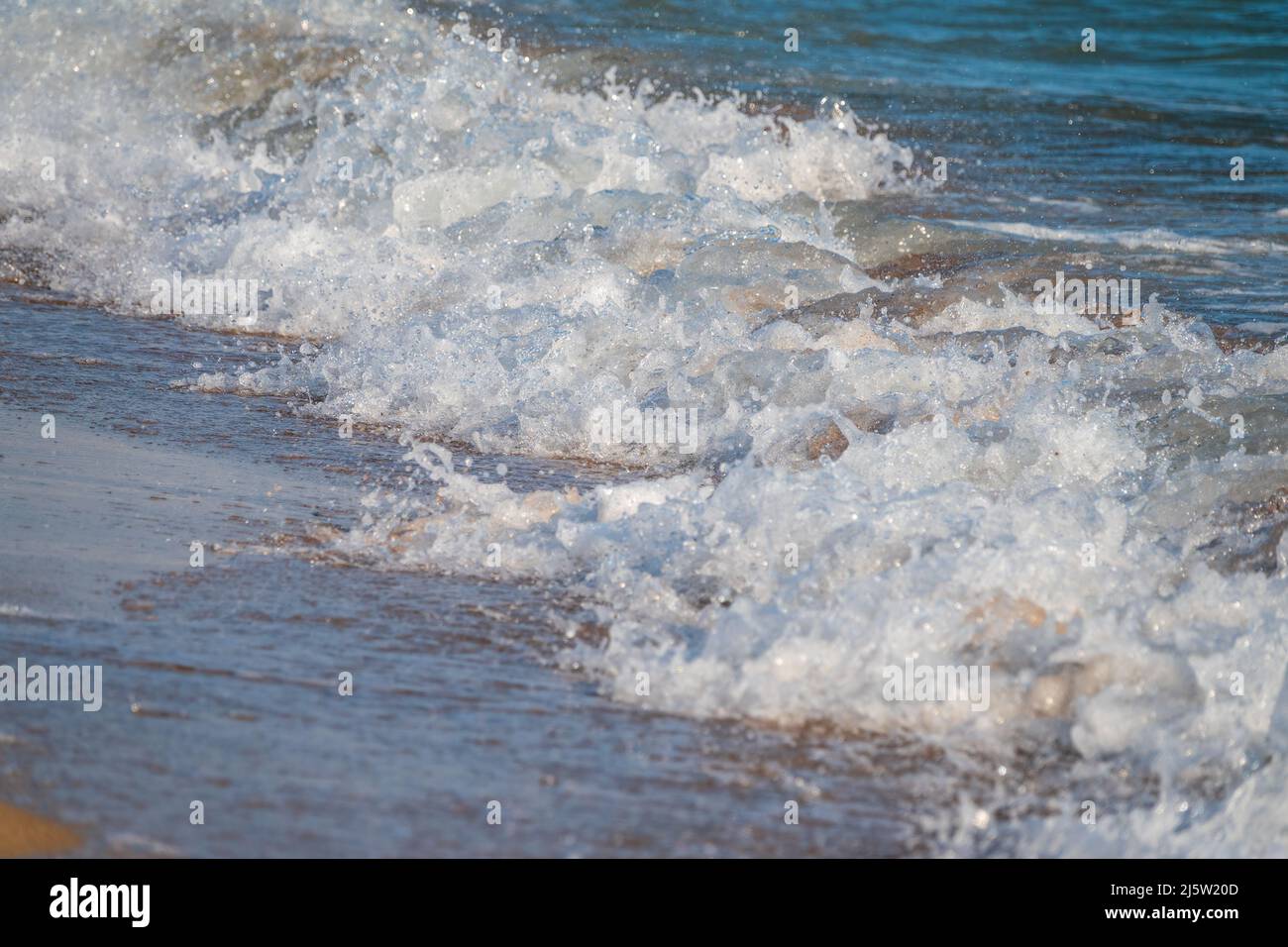 Soft wave of the sea on the sandy beach. Sea wave and gold sand Stock ...