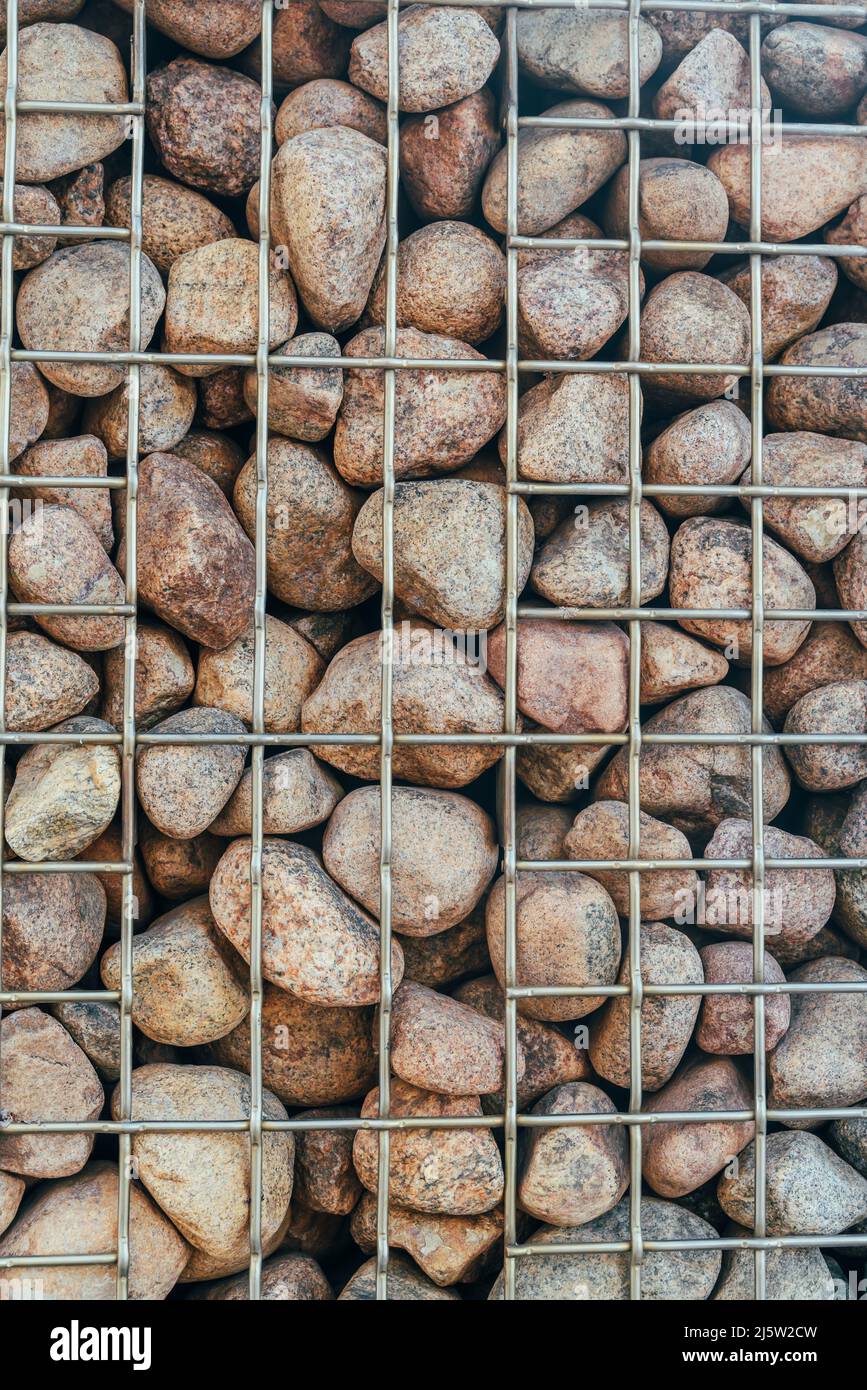 Rocks metal cage hi-res stock photography and images - Alamy