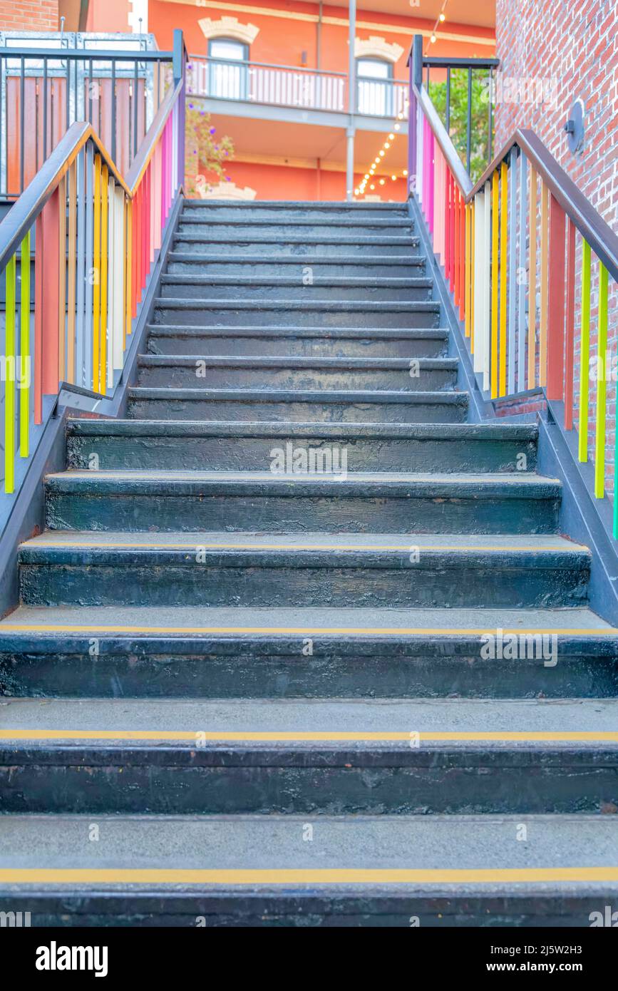 Concrete outdoor stairs with colorful railings near the Fisherman's ...