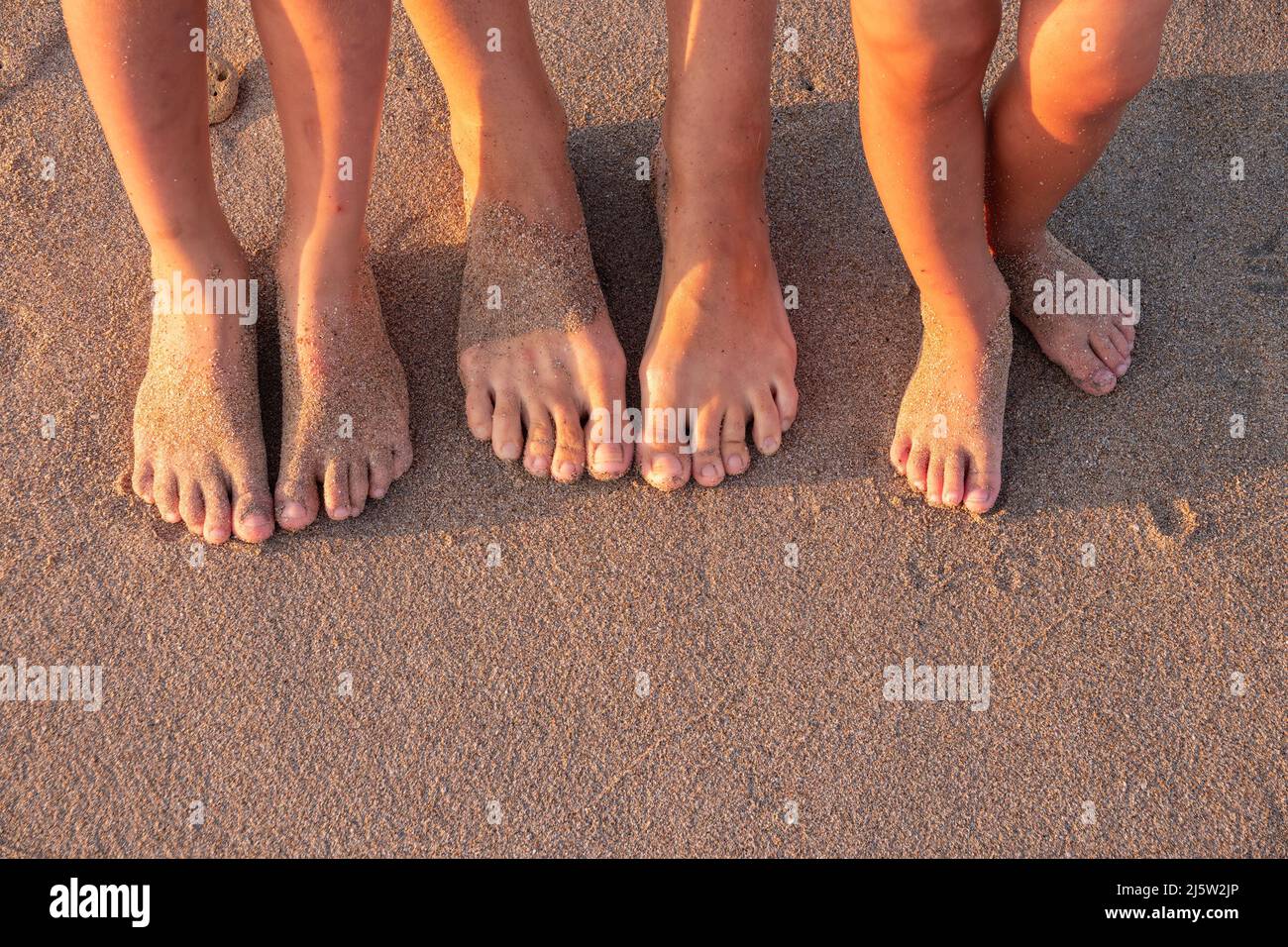 Family feet foot three people hi-res stock photography and images - Alamy