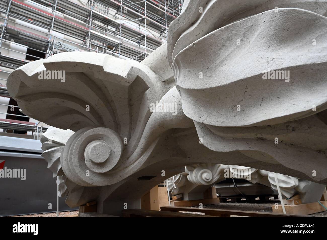 Potsdam, Germany. 21st Apr, 2022. Sandstone elements for the facade lie ...