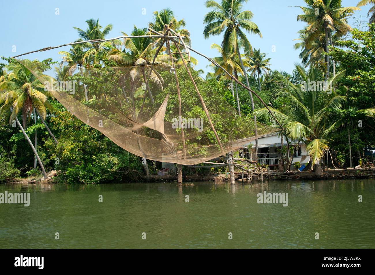 Chinese Fishing Nets in backwater near Kollam state Kerala India Stock ...