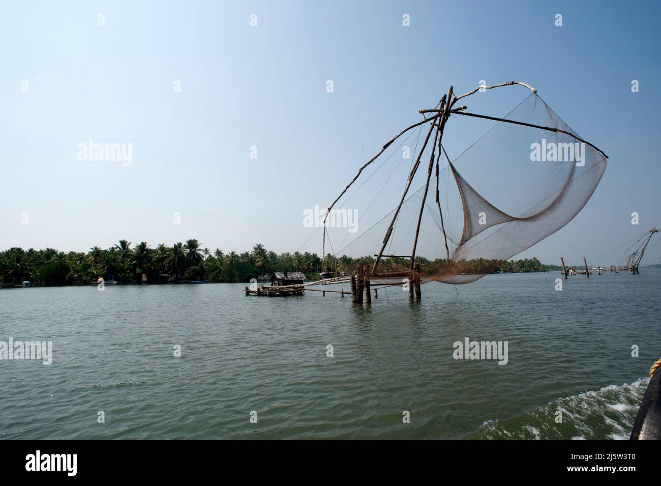 Chinese Fishing Nets in backwater near Kollam state Kerala India Stock ...