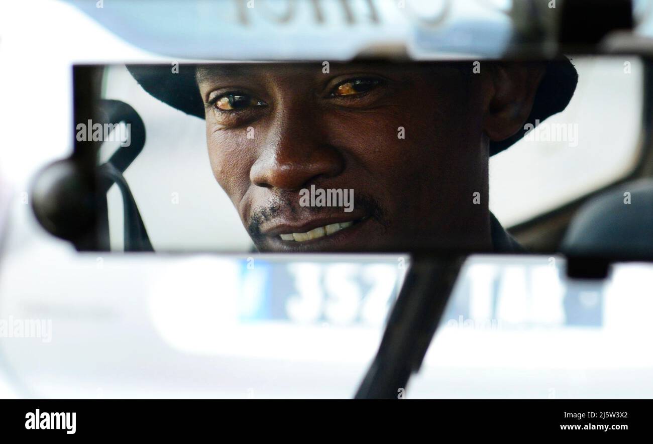 A smiling Malagasy taxi driver in Antananarivo, Madagascar Stock Photo ...